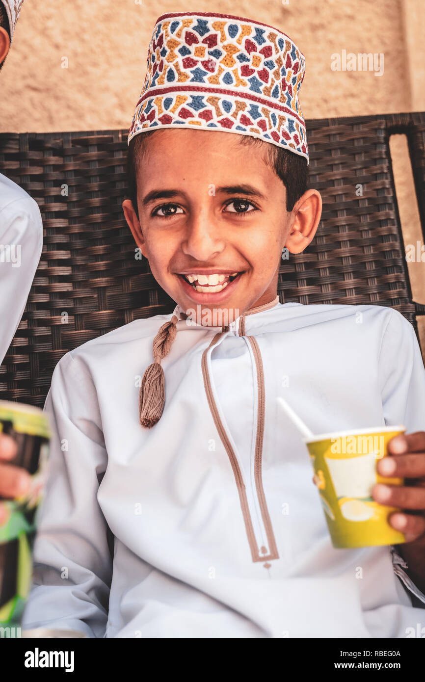 Candid portrait of a cute omani kid in Nizwa Stock Photo - Alamy