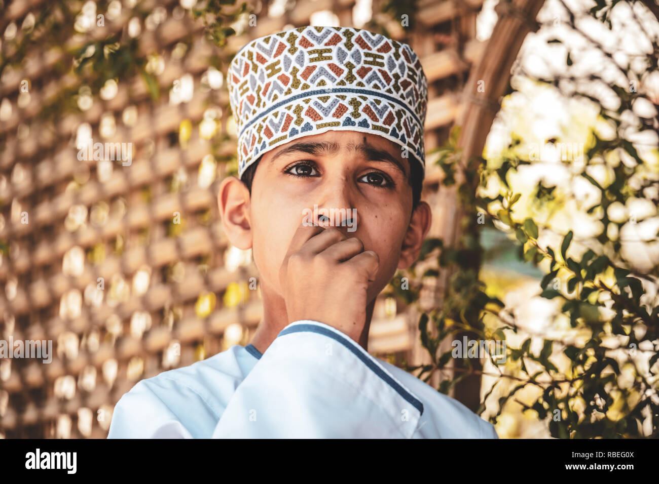 Candid portrait of a cute omani kid in Nizwa Stock Photo - Alamy
