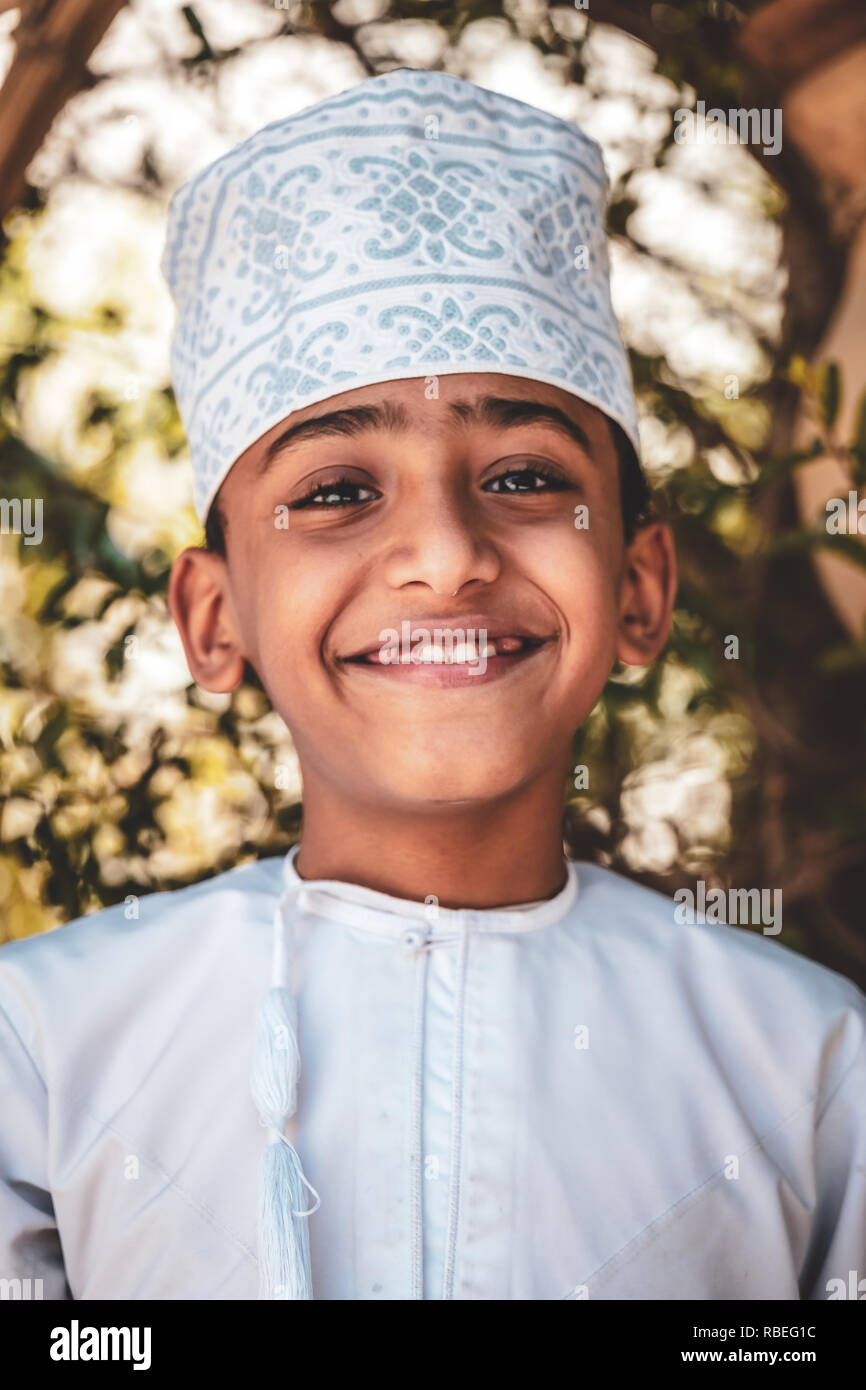 Candid portrait of a cute omani kid in Nizwa Stock Photo - Alamy