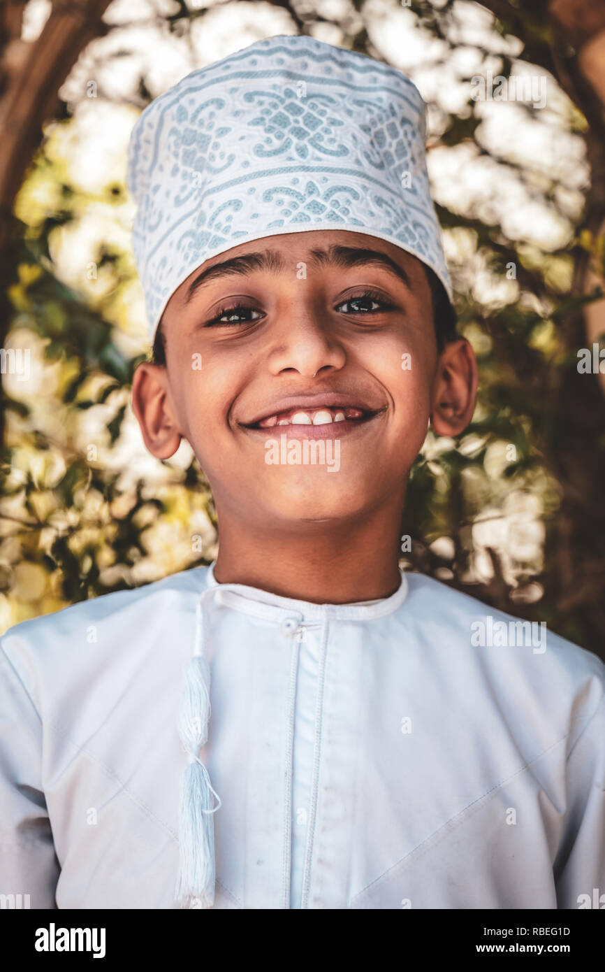 Candid portrait of a cute omani kid in Nizwa Stock Photo - Alamy