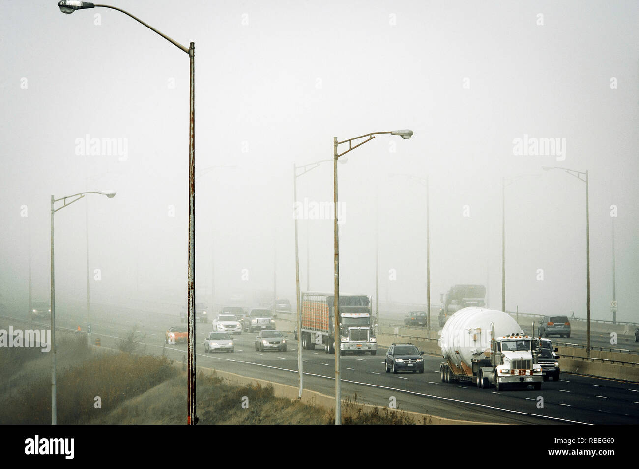 QEW highway in Southern Ontario covered with fog Stock Photo - Alamy