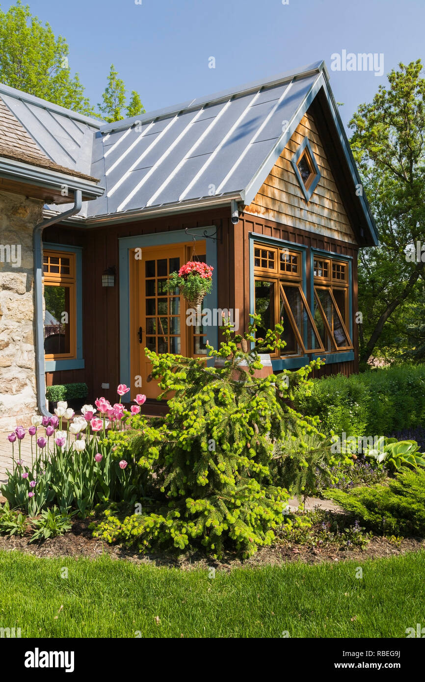 Partial view of an old (circa 1740) Canadiana fieldstone cottage style ...