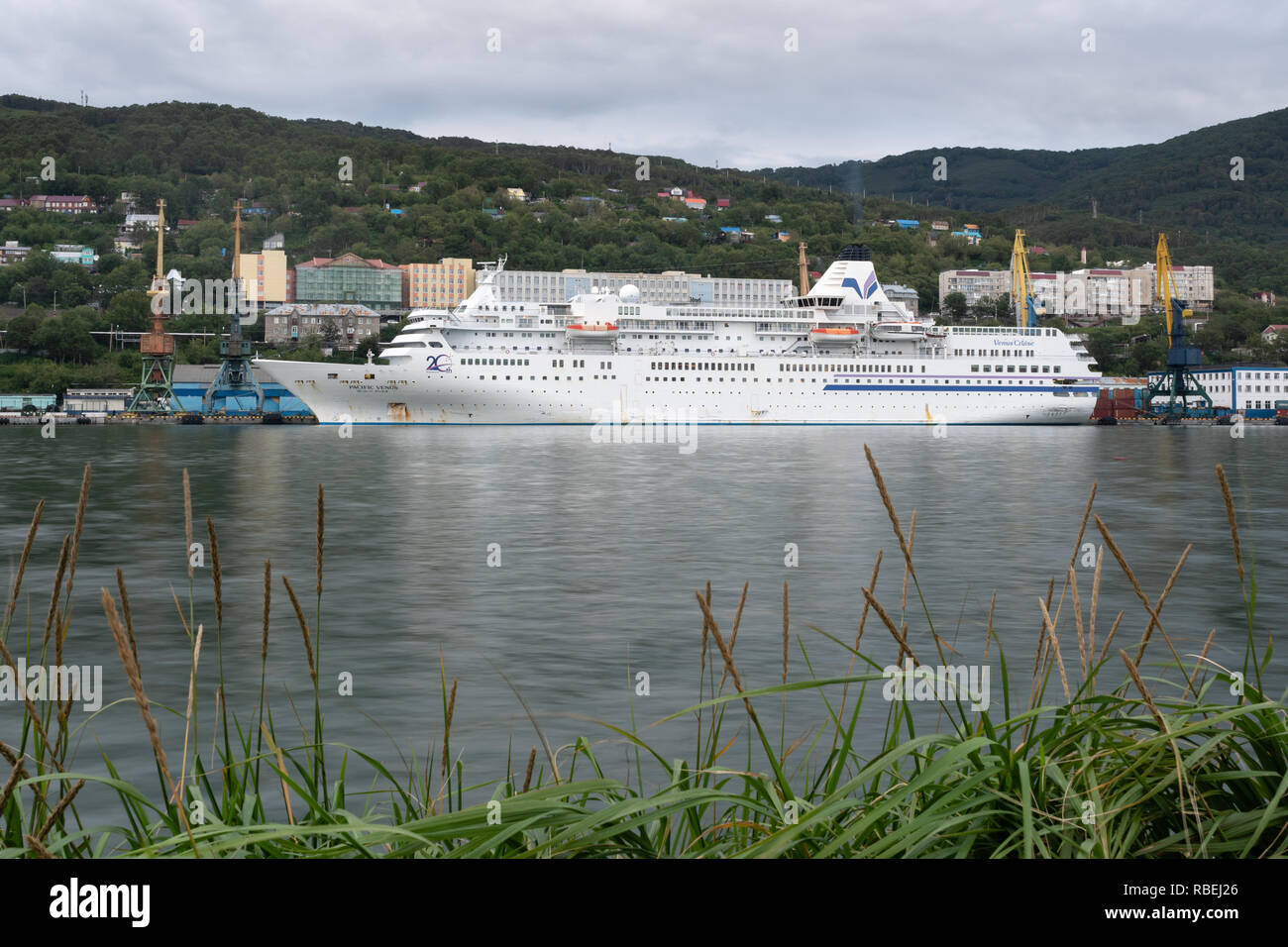 Evening view of white Japanese cruise liner Pacific Venus anchored at ...