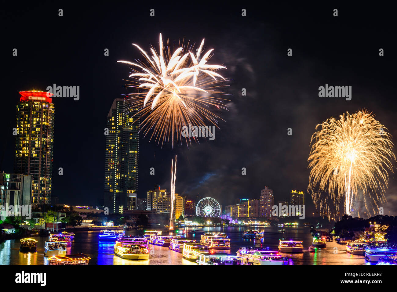 Fireworks at the river of city in New Year countdown time Stock Photo ...