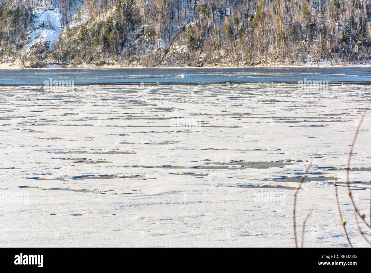 Ice floe floating on the melted snow and ice of the river Stock Photo ...