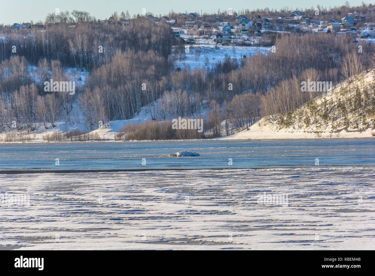 Ice floe floating on the melted snow and ice of the river Stock Photo ...