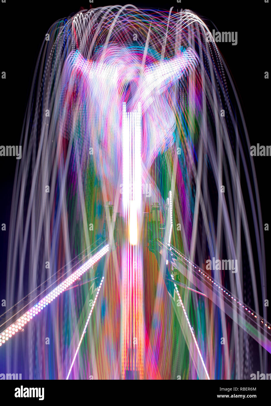 Long Exposure Of A Spinning Carnival Ride Stock Photo - Alamy
