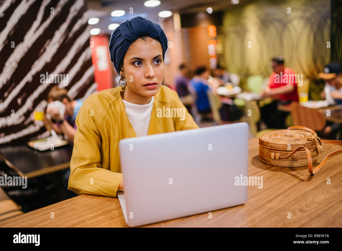 Singapore cafe laptop hi-res stock photography and images - Alamy