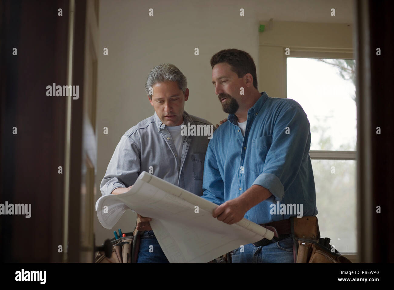 Looking at a drawing hi-res stock photography and images - Alamy