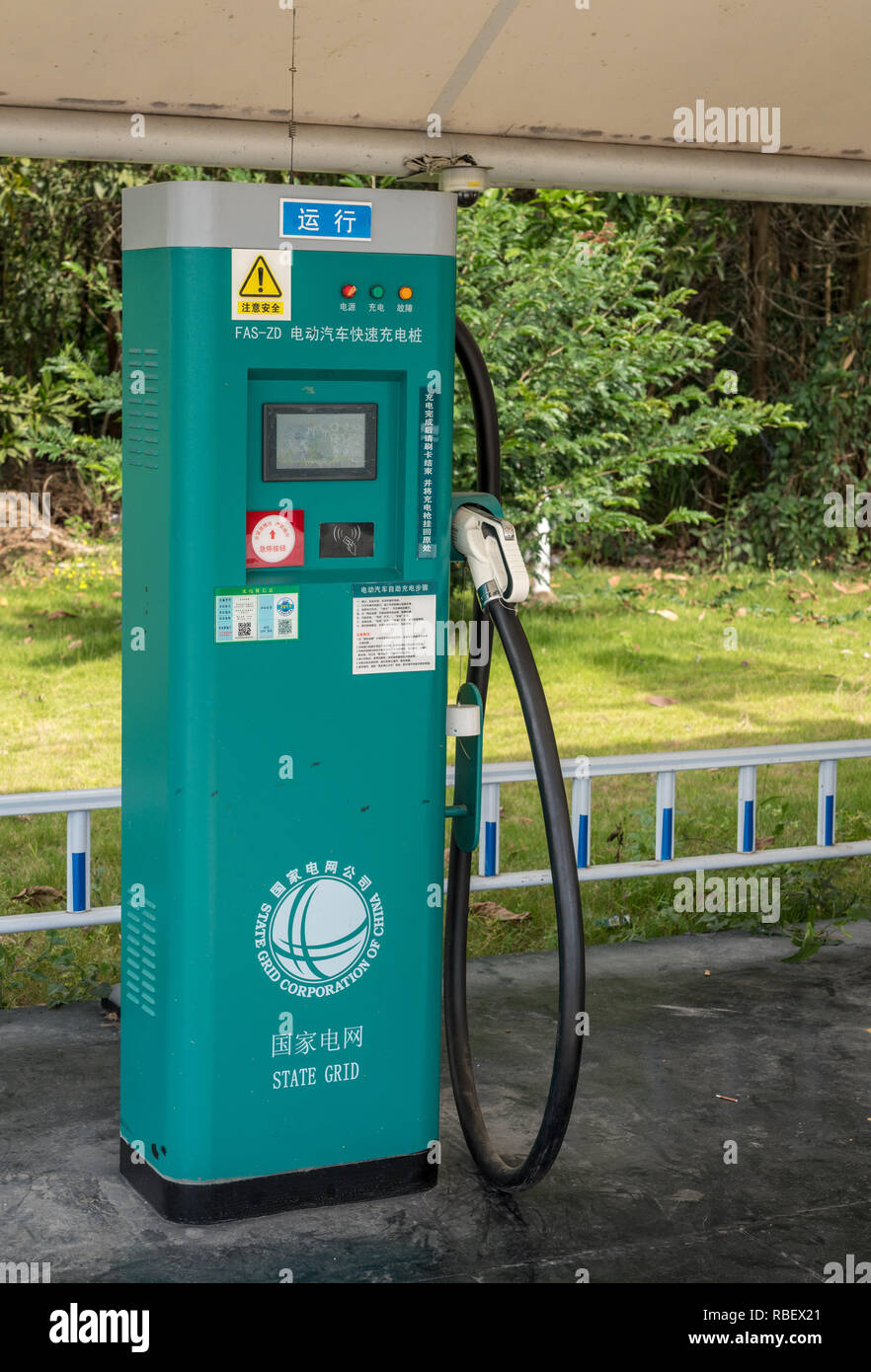 Electric Vehicle recharging station in China Stock Photo - Alamy
