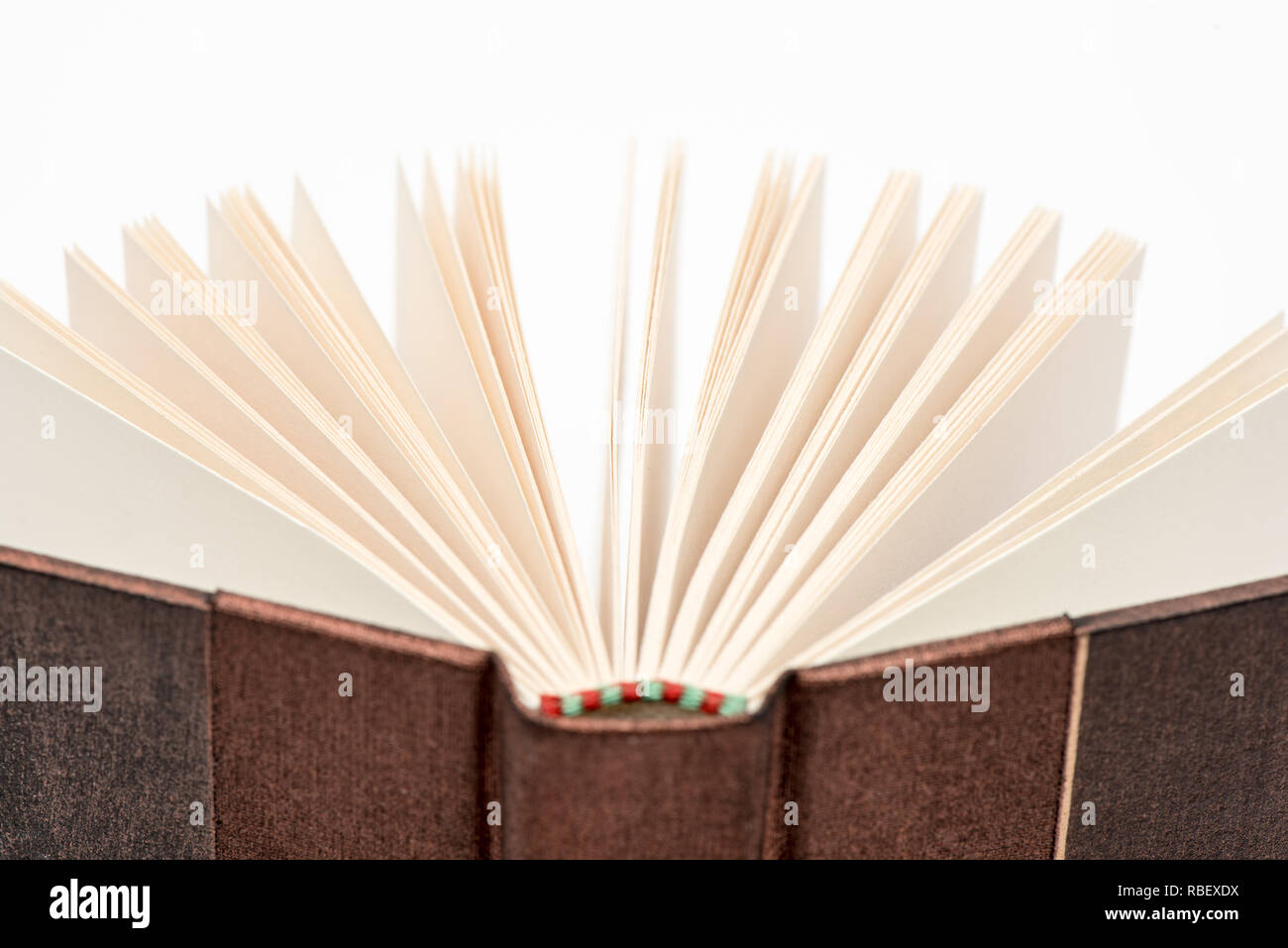 Open empty white book. Closeup of several pages from a book, view from ...