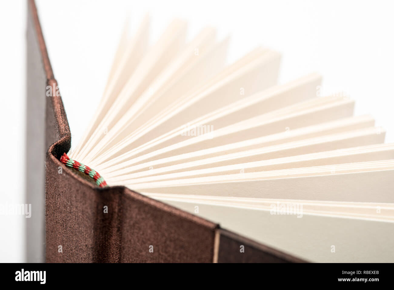 Open empty white book. Closeup of several pages from a book, view from ...