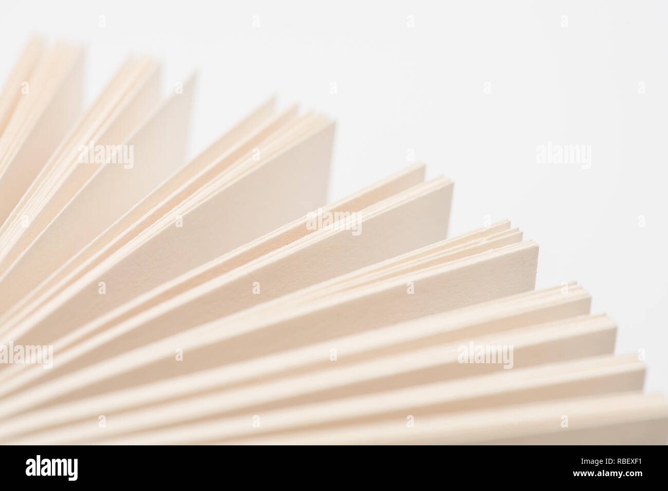 Open empty white book. Closeup of several pages from a book, view from ...