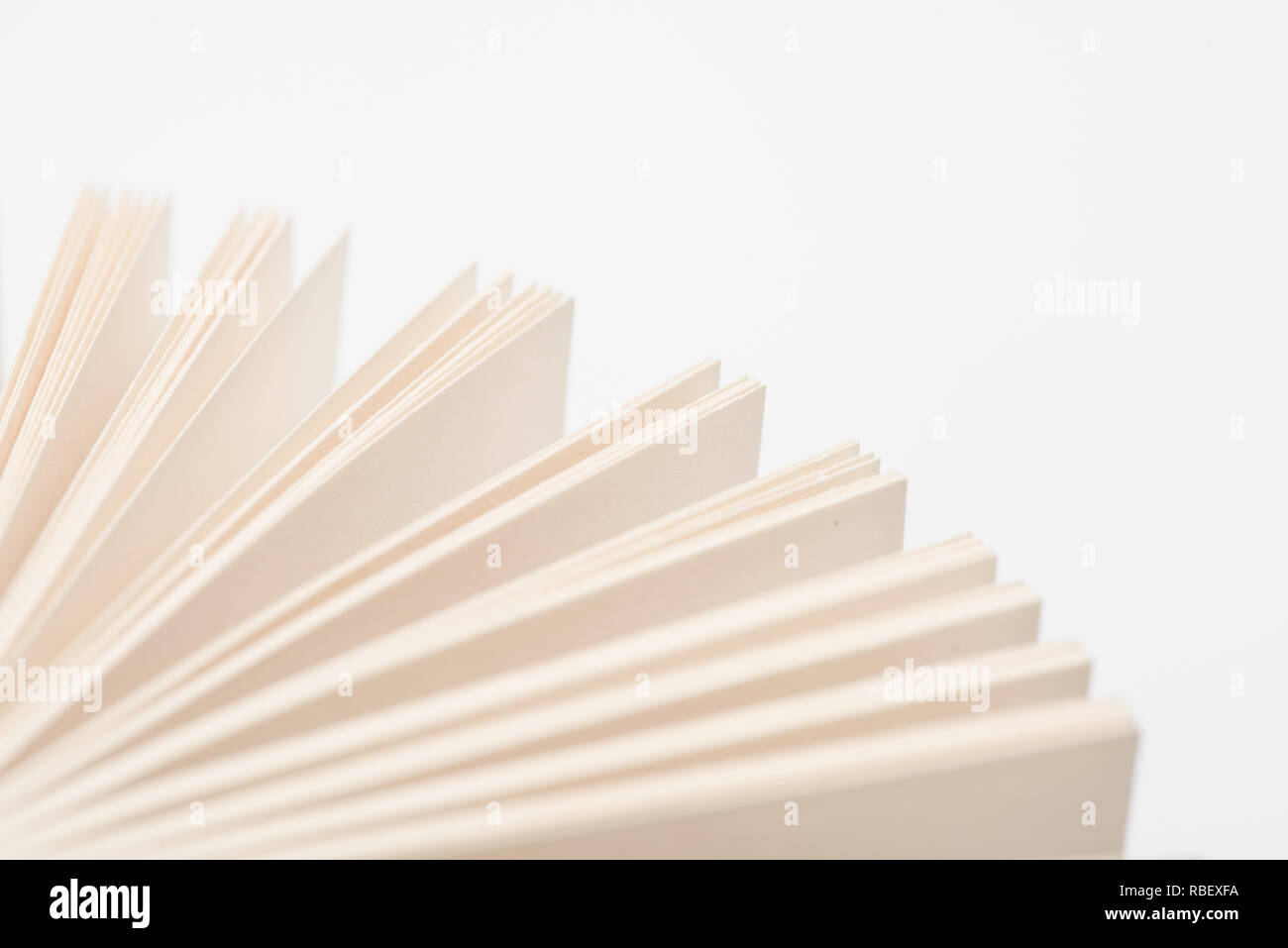Open empty white book. Closeup of several pages from a book, view from ...
