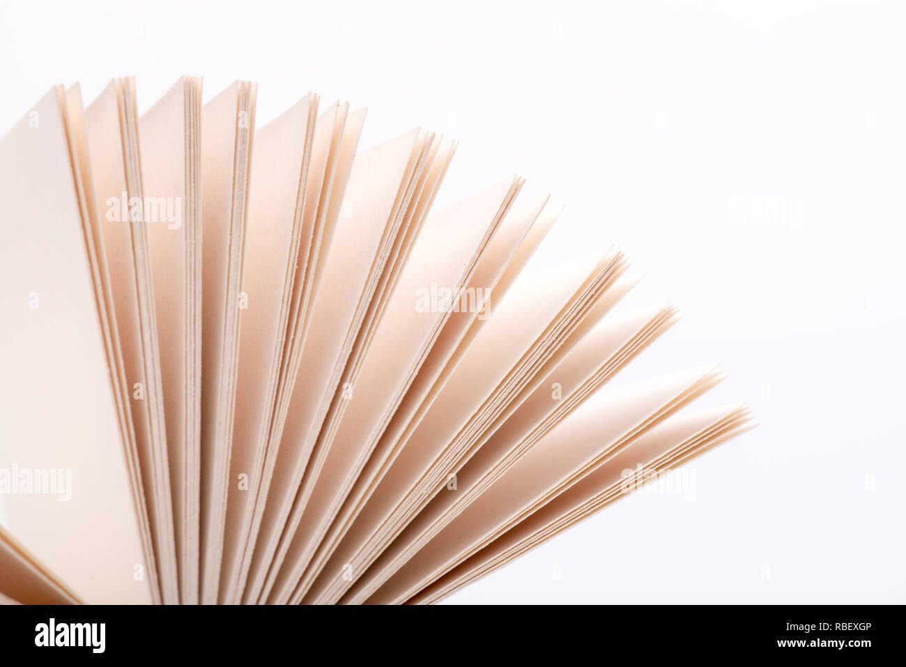 Open empty white book. Closeup of several pages from a book, view from ...