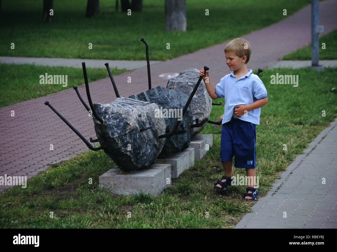 Dying ant stone sculpture Stock Photo - Alamy