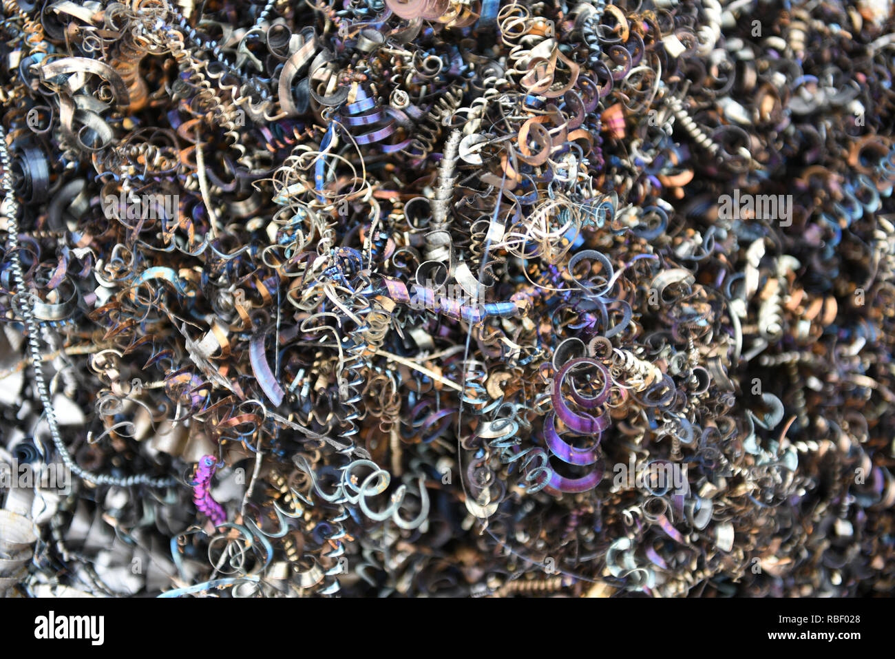 Discarded tangled twisted pieces industrial scrap metal waste, lathe ...