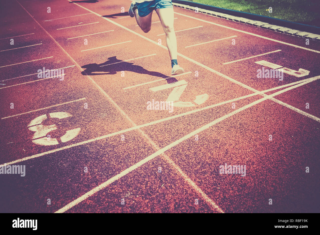 athlete on running track Stock Photo - Alamy