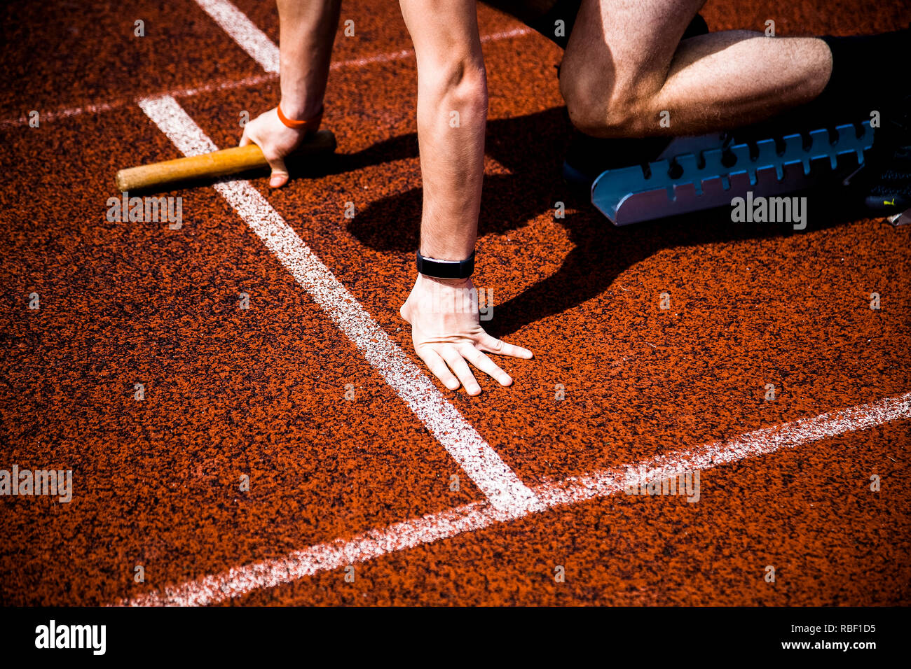 athlete on running track Stock Photo - Alamy