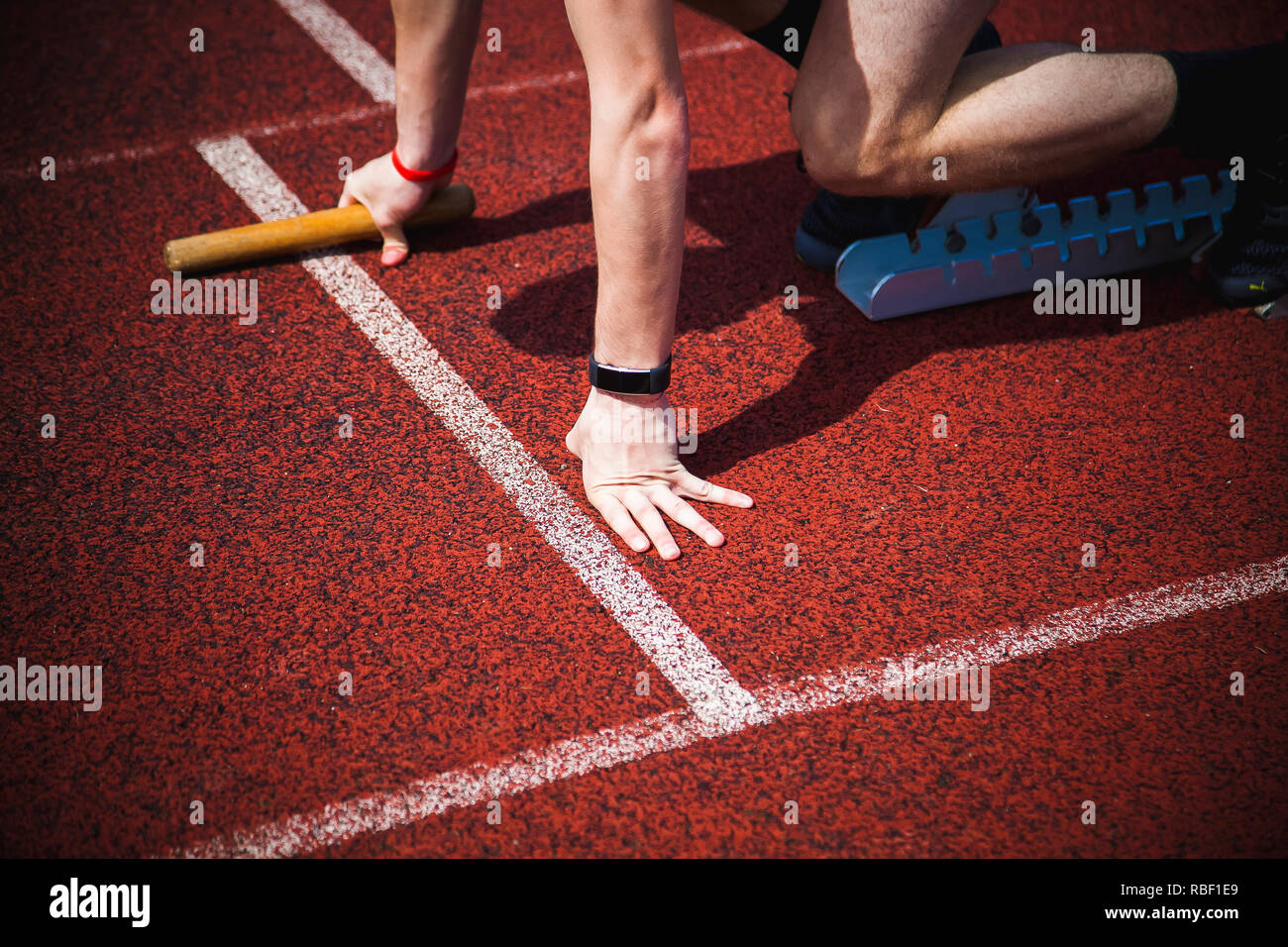 athlete on running track Stock Photo - Alamy