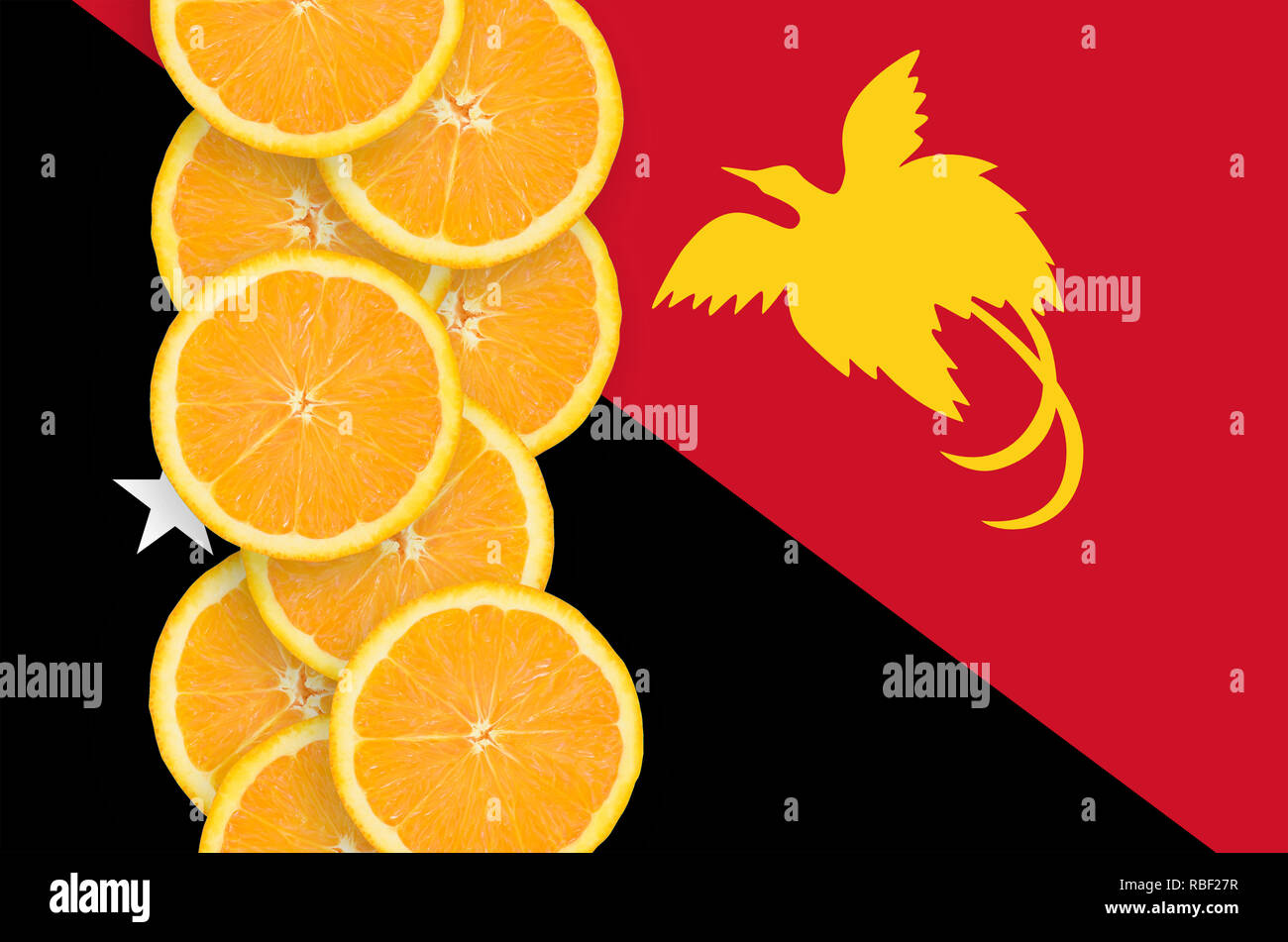 Papua New Guinea flag and vertical row of orange citrus fruit slices ...