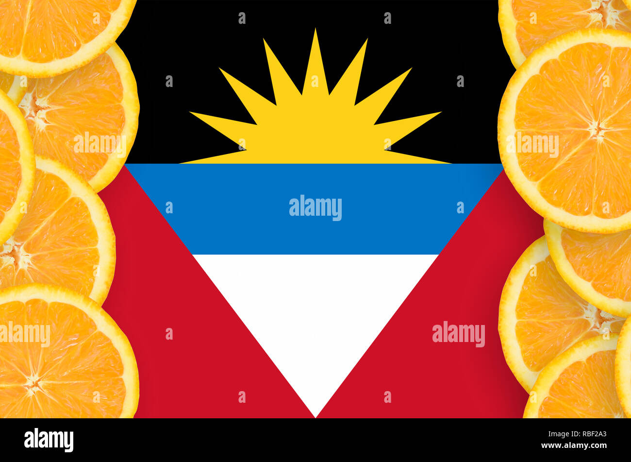 Antigua and Barbuda flag in vertical frame of orange citrus fruit ...