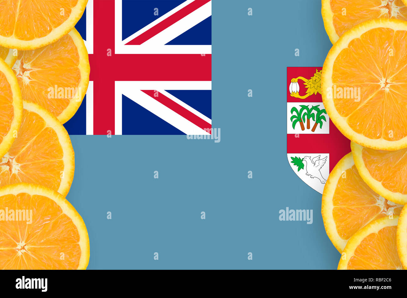 Fiji flag in vertical frame of orange citrus fruit slices. Concept of ...