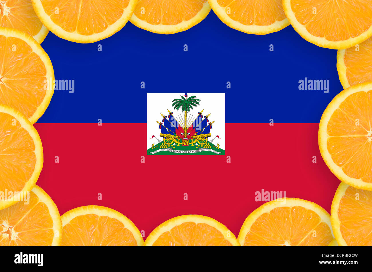 Haiti flag in frame of orange citrus fruit slices. Concept of growing ...