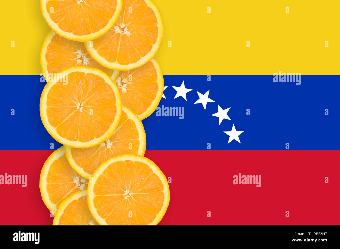 Venezuela flag and vertical row of orange citrus fruit slices. Concept ...