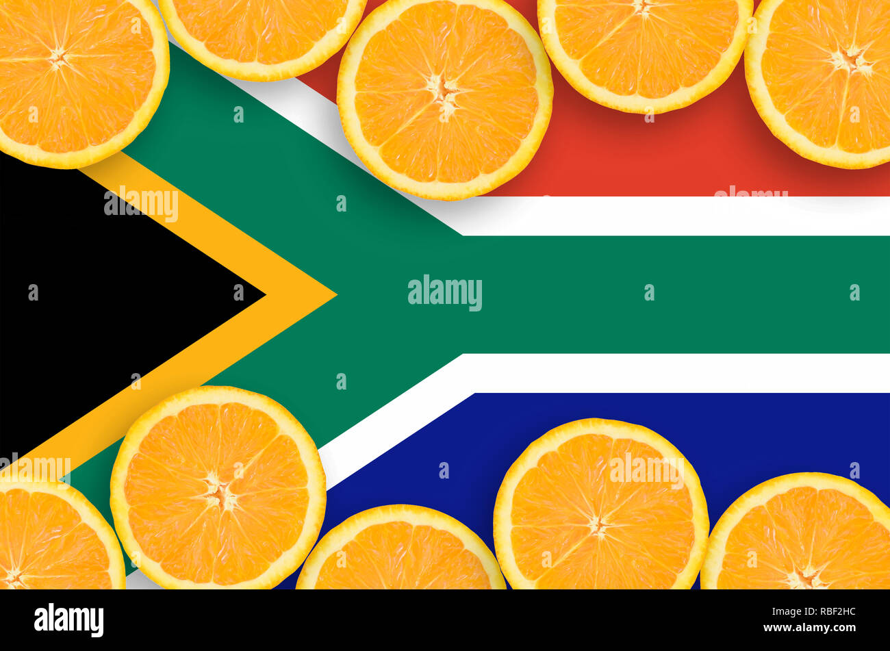 South Africa flag in horizontal frame of orange citrus fruit slices ...