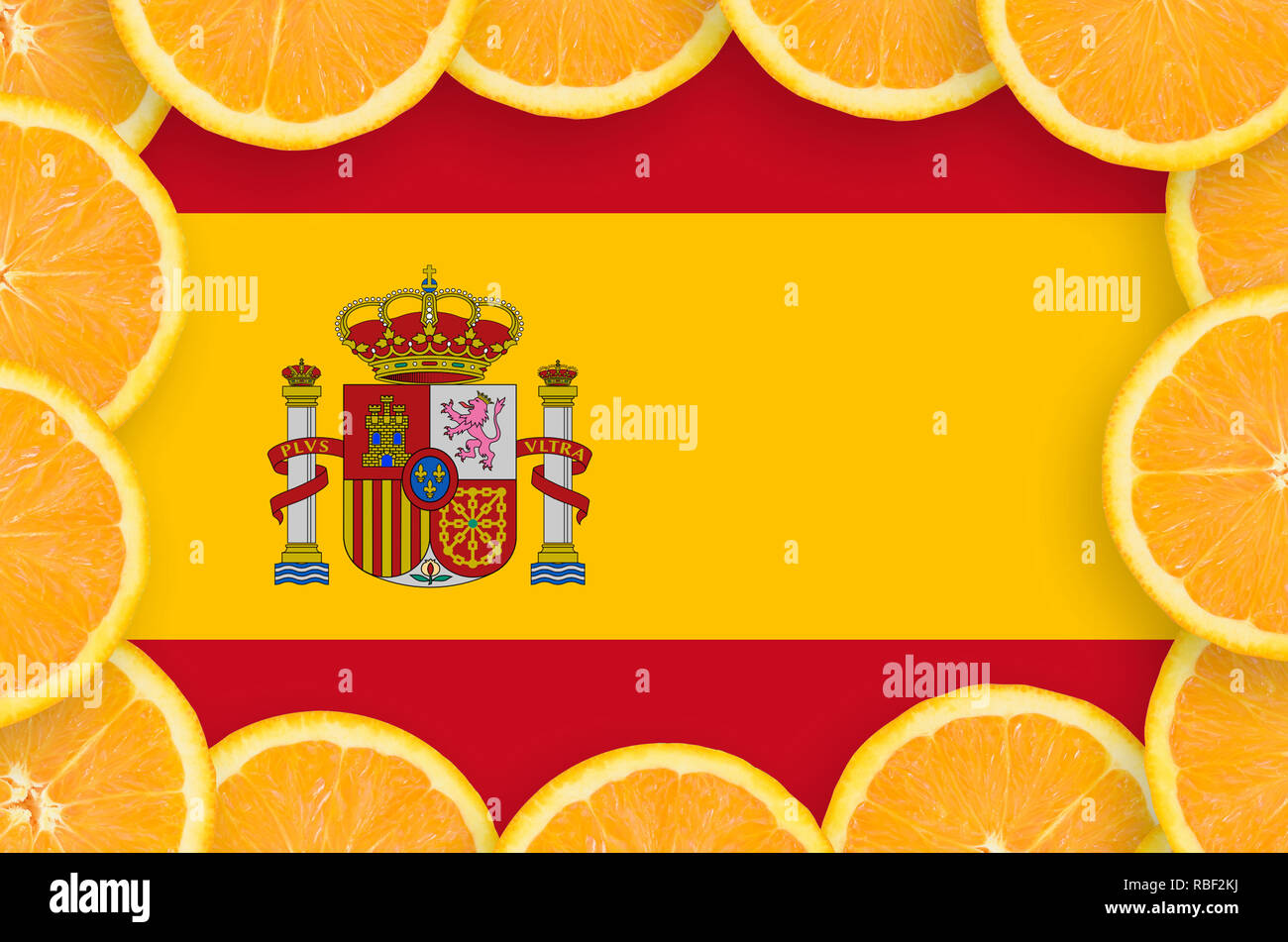 Spain flag in frame of orange citrus fruit slices. Concept of growing ...