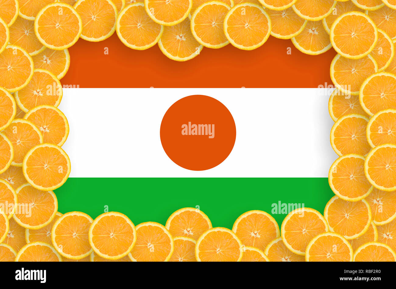 Niger flag in frame of orange citrus fruit slices. Concept of growing ...