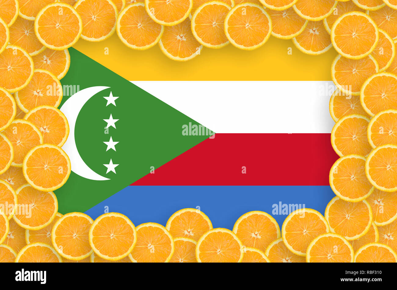 Comoros flag in frame of orange citrus fruit slices. Concept of growing ...