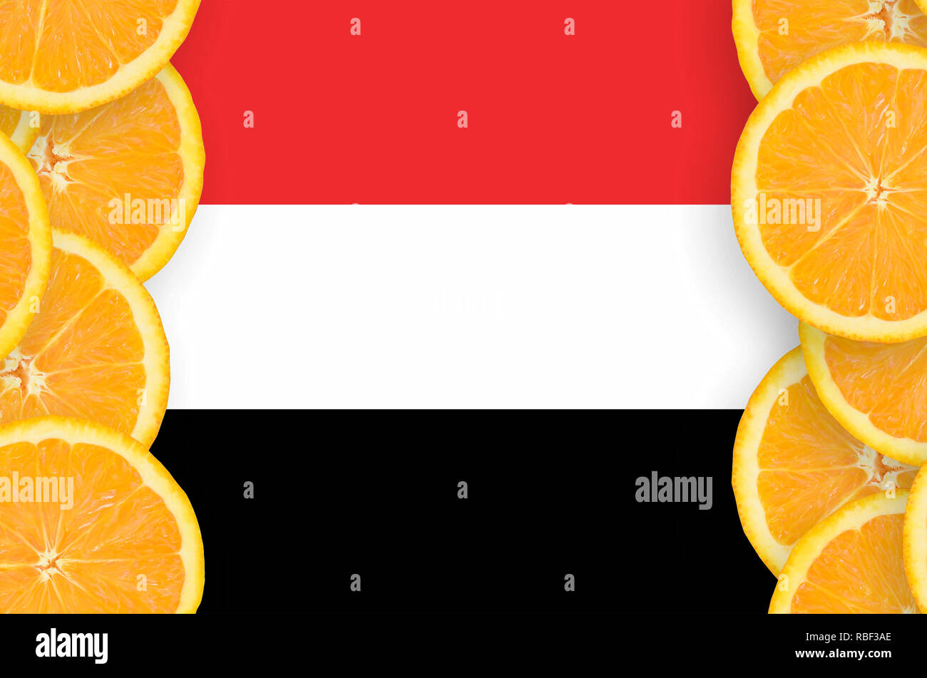Yemen flag in vertical frame of orange citrus fruit slices. Concept of ...