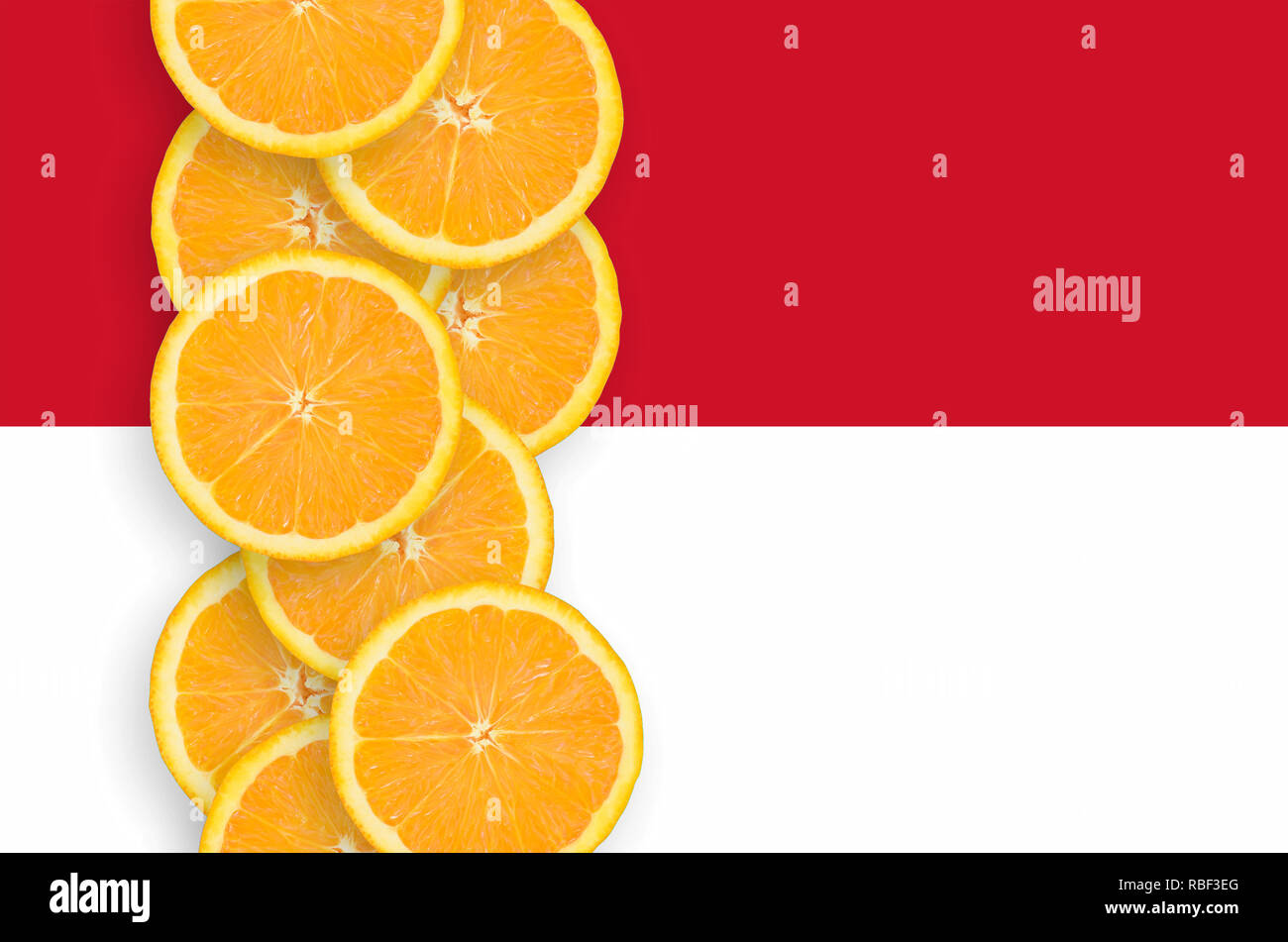 Monaco flag and vertical row of orange citrus fruit slices. Concept of ...