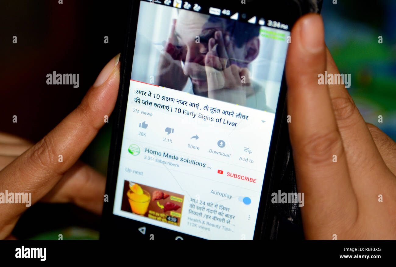 Watching Video On Cellphone Stock Photo - Alamy