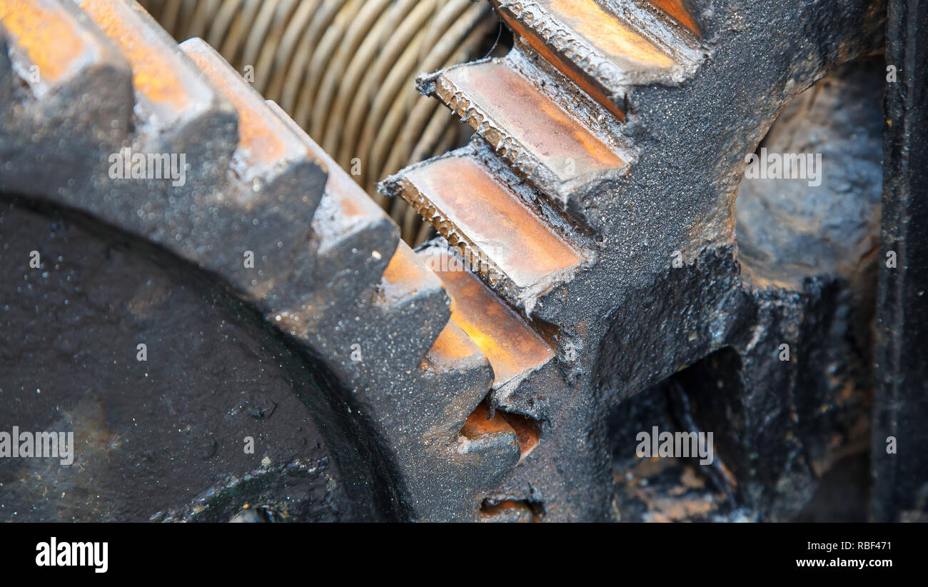 large steel greased gears in a single mechanism Stock Photo - Alamy