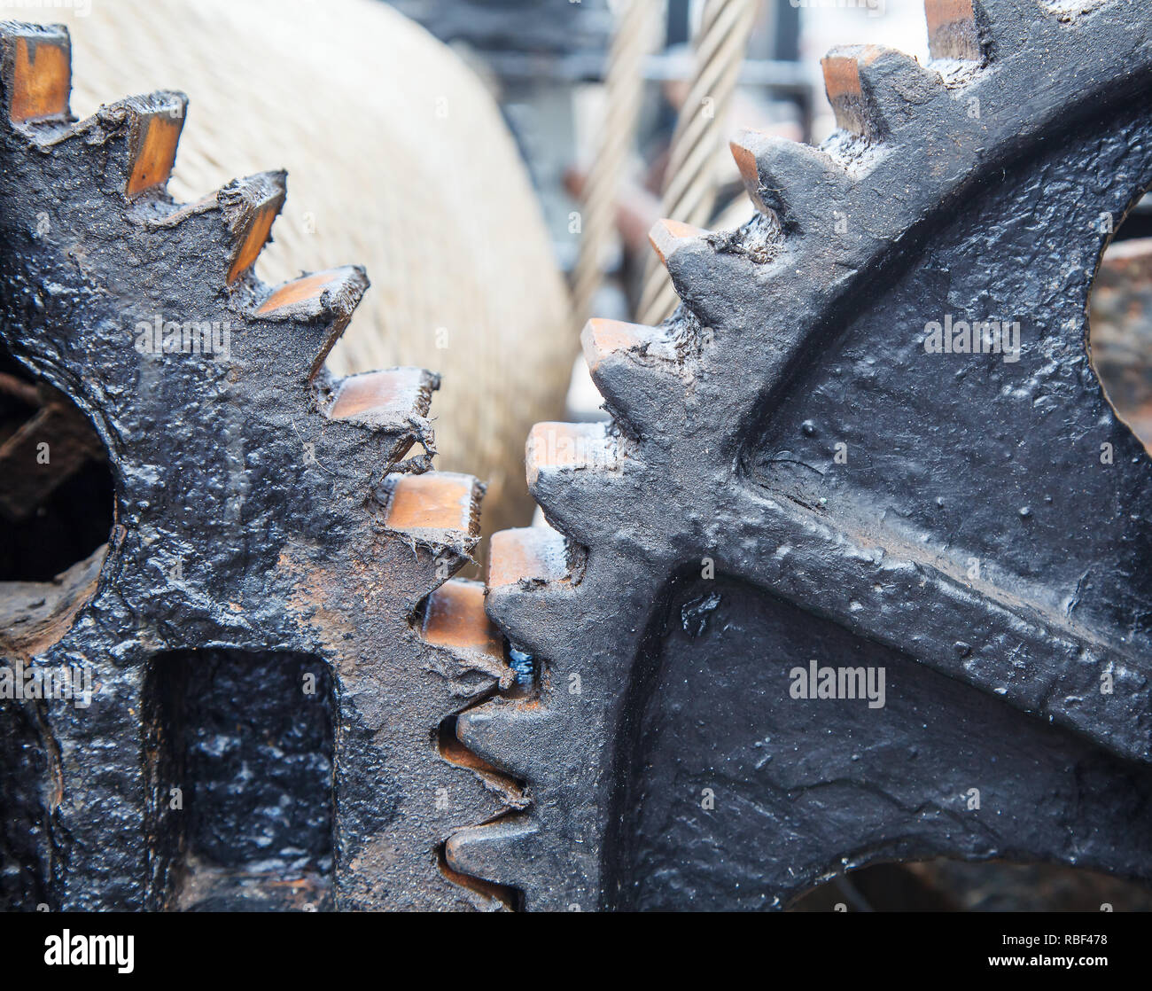 large steel greased gears in a single mechanism Stock Photo - Alamy