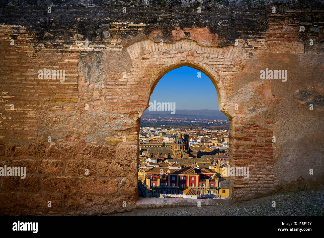 Alhambra arch and Granada skyline photo illustration Stock Photo - Alamy