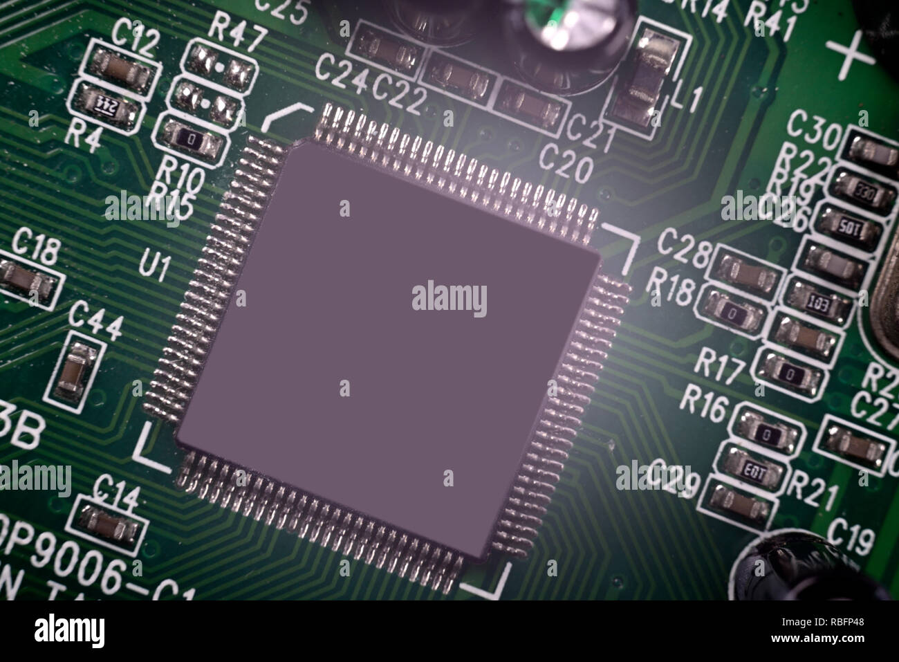 Close-up of Electronic chip in a computer circuit board Stock Photo - Alamy