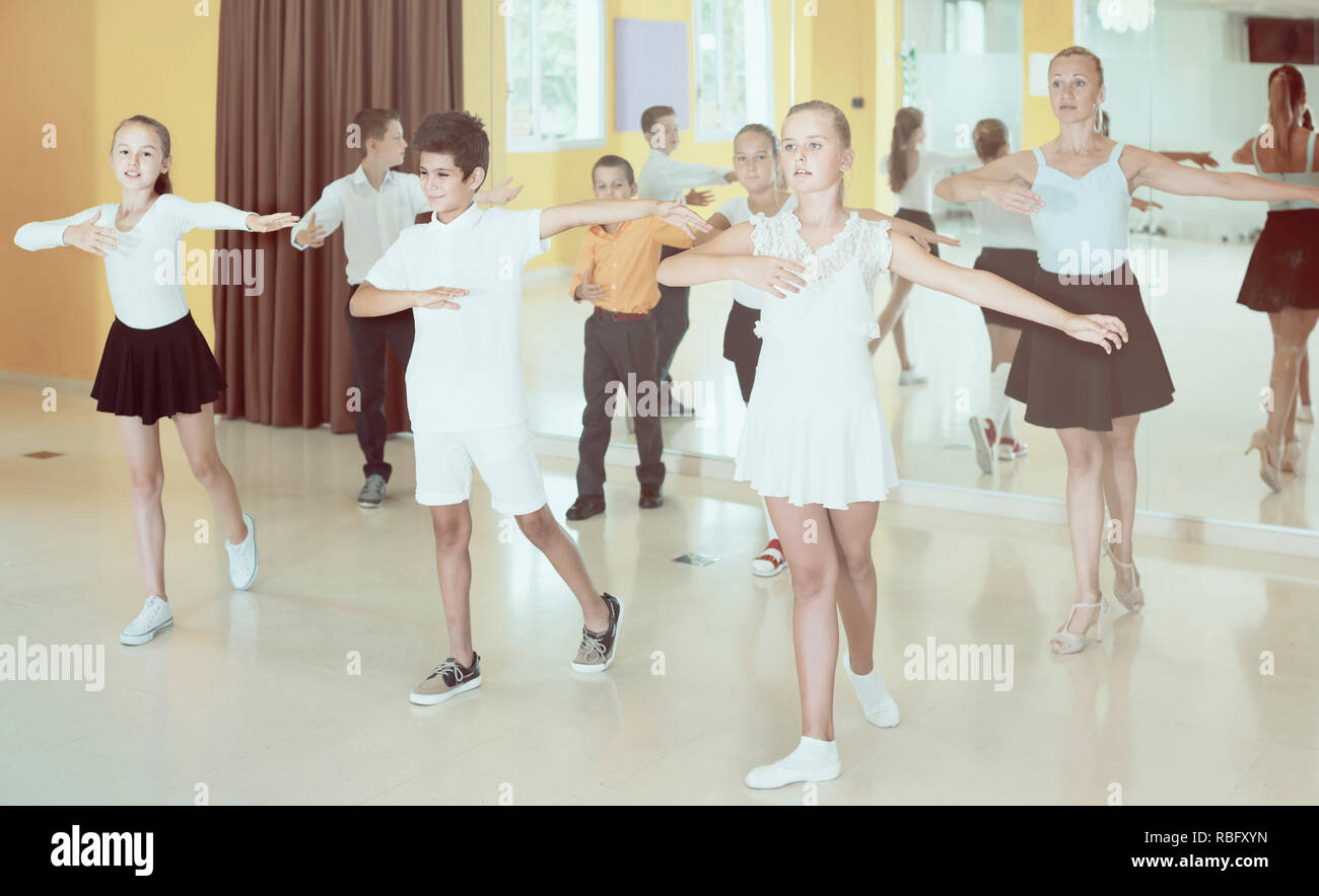 positive children learn dance movements in dance class Stock Photo - Alamy