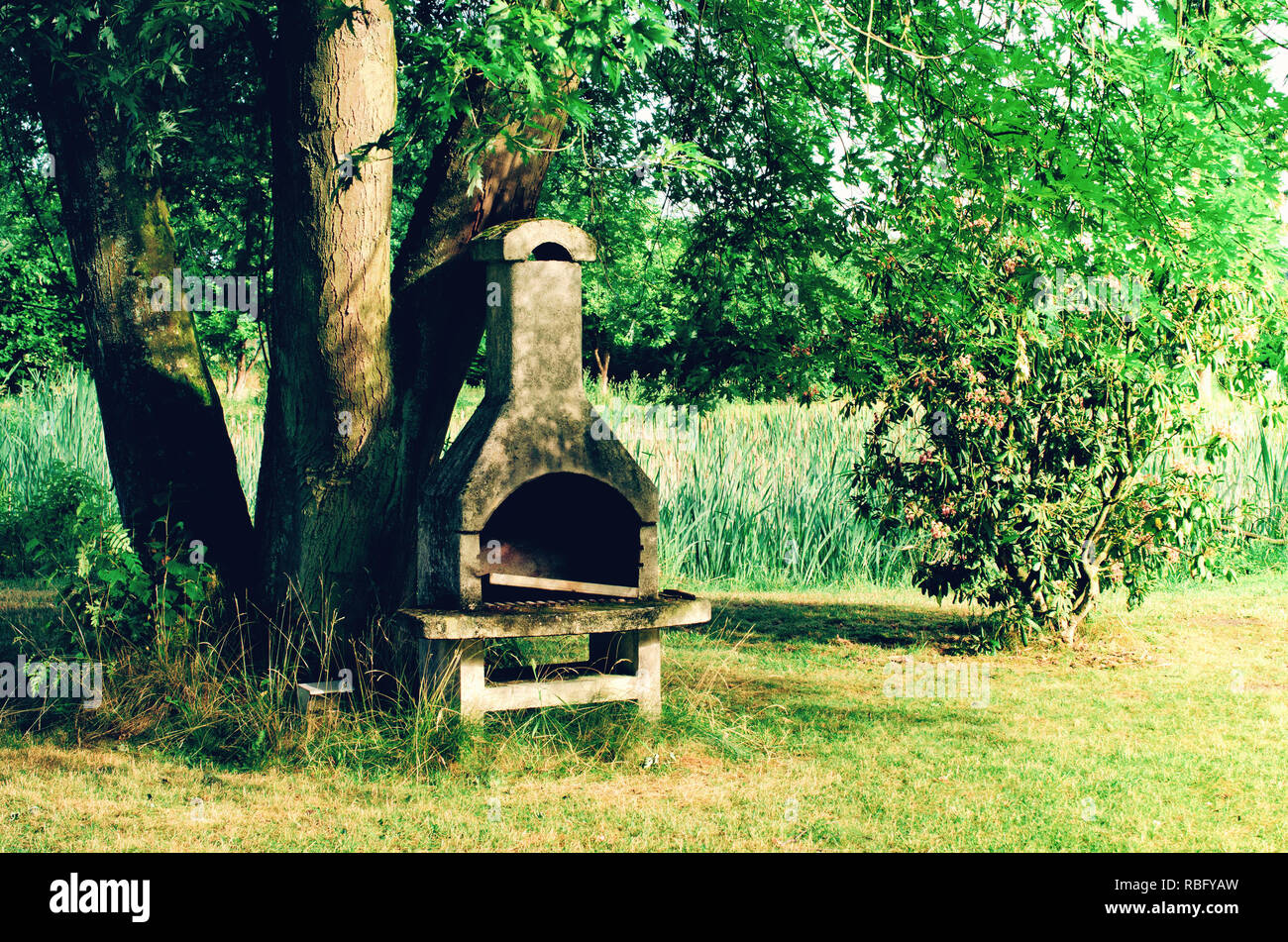 Stone barbecue grill Stock Photo - Alamy