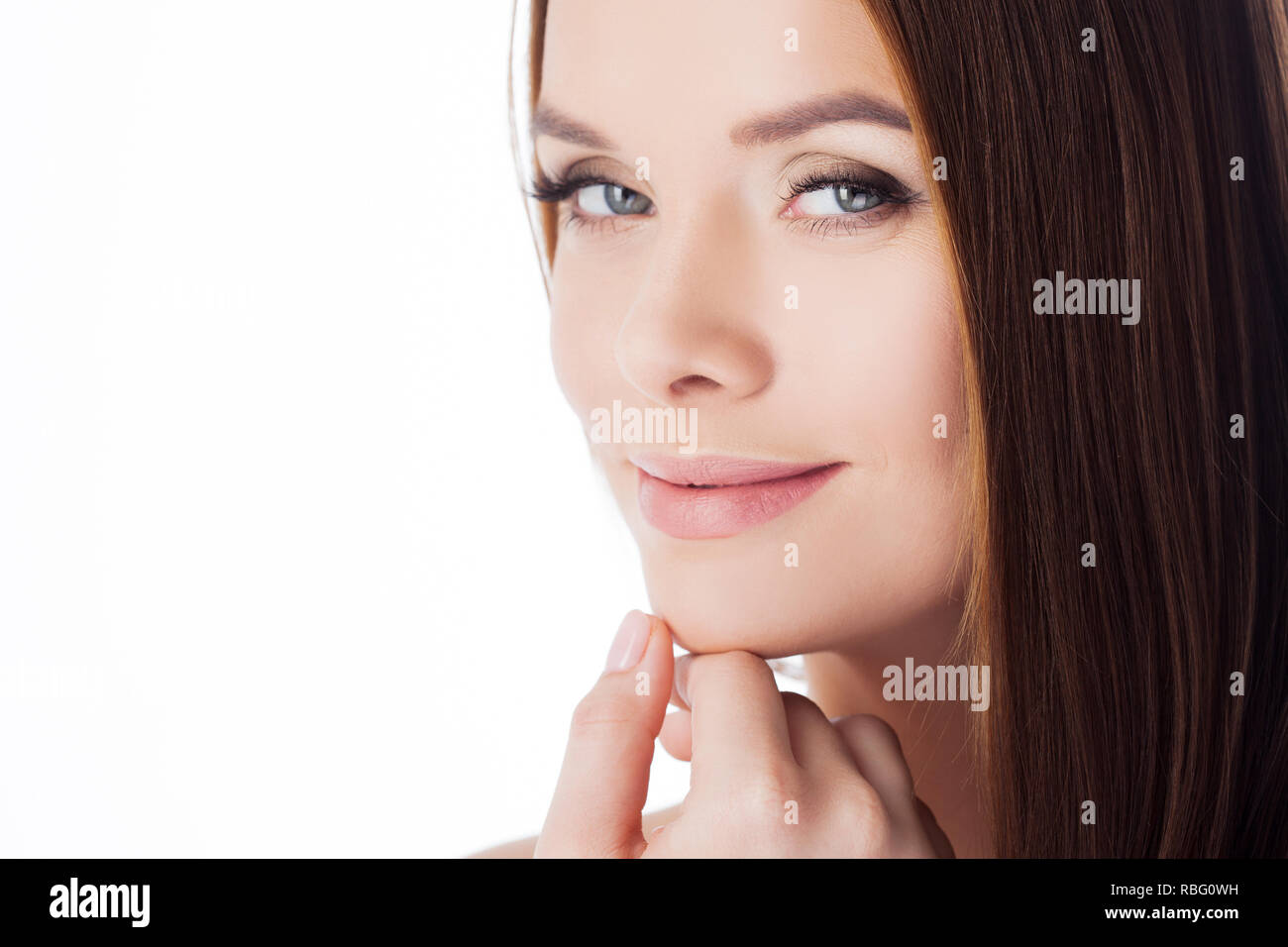 Skin care. The girl touches her face, close-up. Portrait of young ...