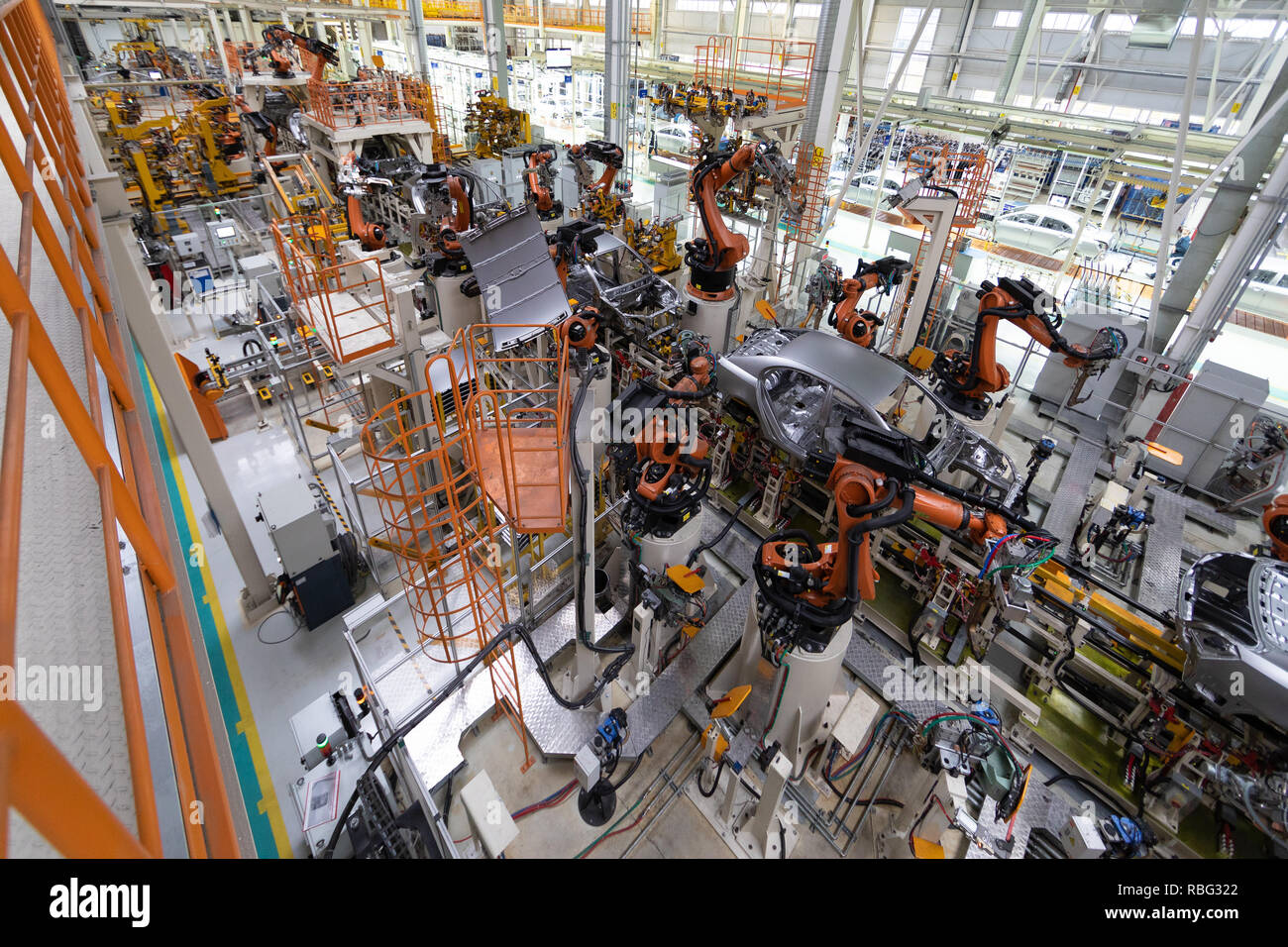 body of car on conveyor top view. Modern Assembly of cars at the plant ...