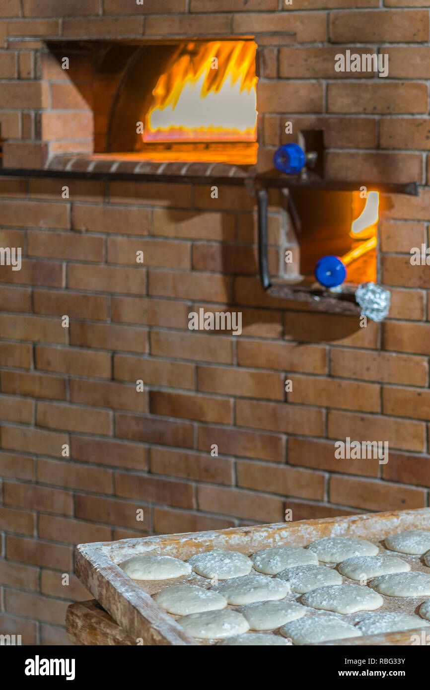Brick oven for baking bread. A traditional oven for cooking and baking ...
