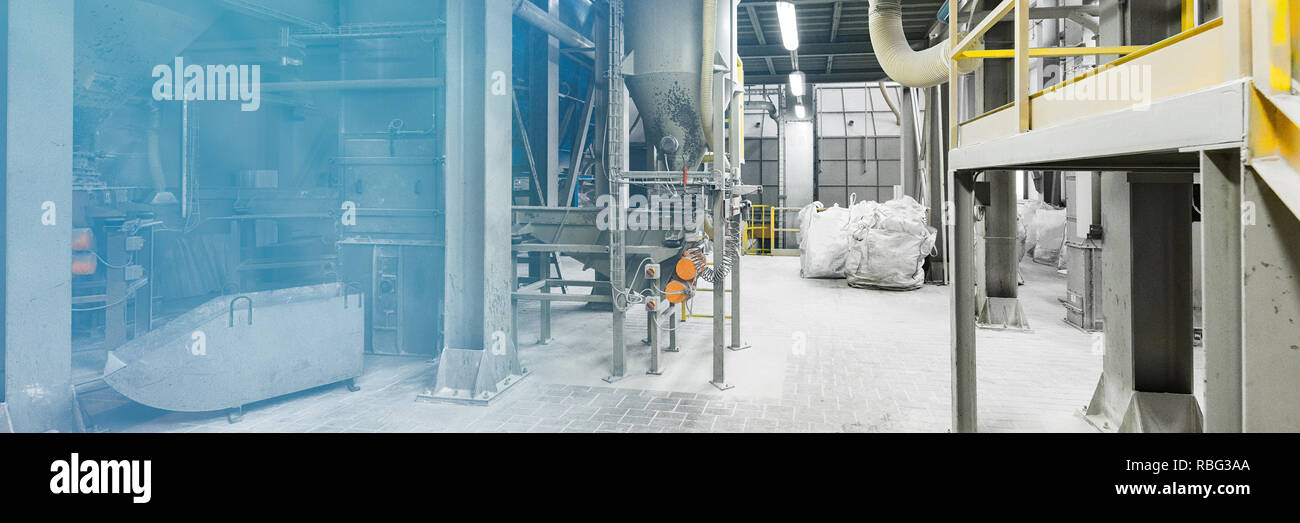 Fiberglass production industry equipment at manufacture background ...