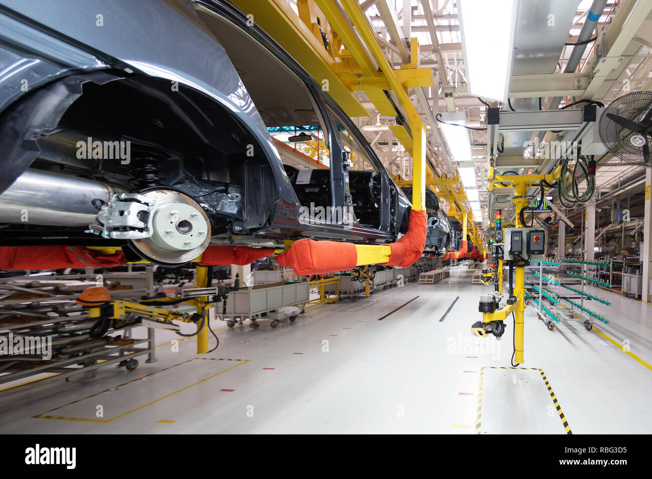 transfer of car body bottom view. Robotic equipment makes the Assembly ...