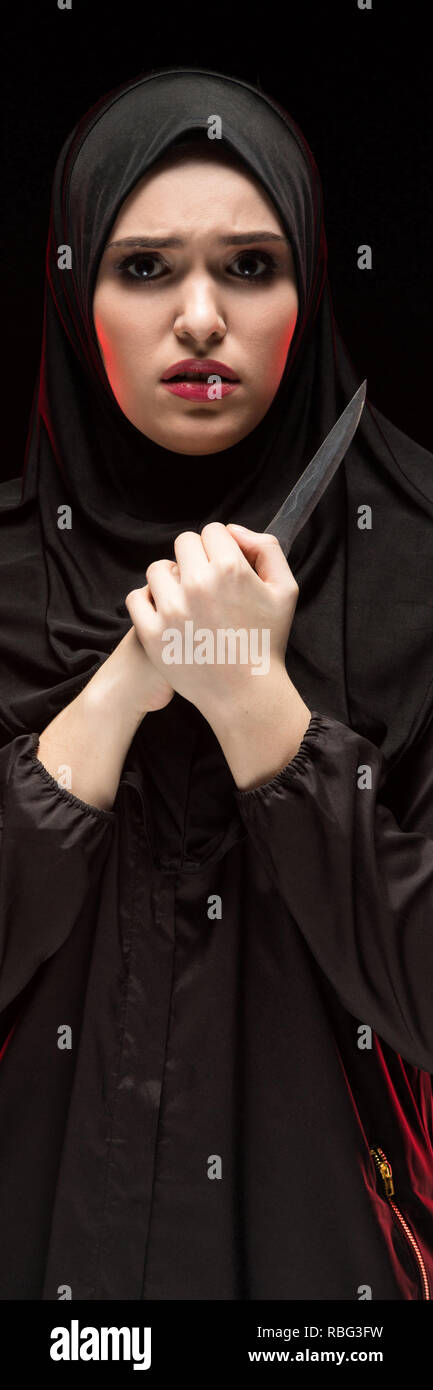 Portrait of beautiful desperate scared frightened young muslim woman ...