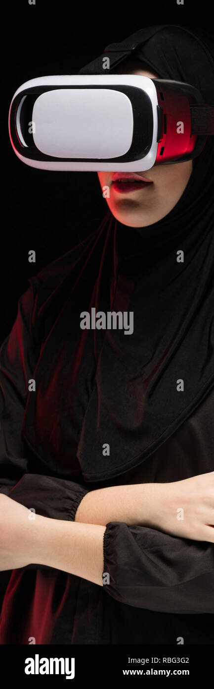 Portrait of beautiful smart young muslim woman wearing black hijab ...