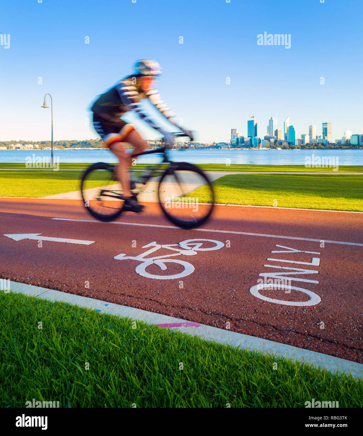 Riding bicycle path wearing helmet hi-res stock photography and images ...